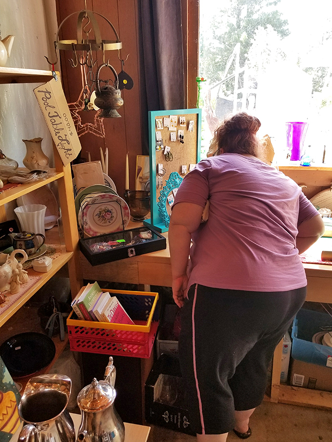 Vintage treasures and handcrafted curiosities await new stories. One person's forgotten teapot becomes another's cherished heirloom at this eclectic booth.