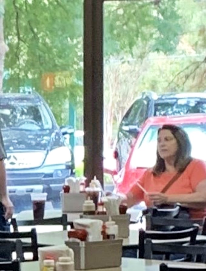 The dining area offers a front-row seat to the sandwich theater, where every table is essentially the best seat in the house.