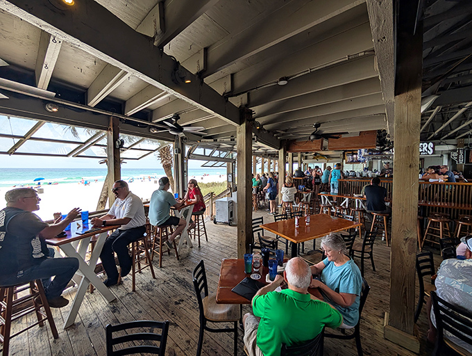 The best seat in the house? Any that faces that million-dollar view of the Gulf. These diners know the secret ingredient is that Panama City Beach horizon.