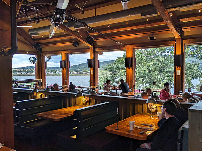 The dining room where memories are made. Wood, windows, and wonderful food &ndash; the holy trinity of great BBQ experiences.