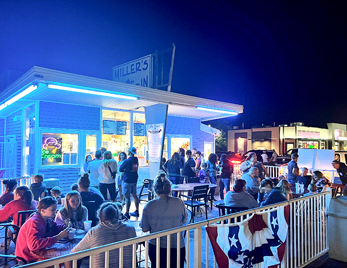 As night falls, Miller's transforms into a community gathering spot. The blue glow of the lights draws people like moths to a delicious flame.