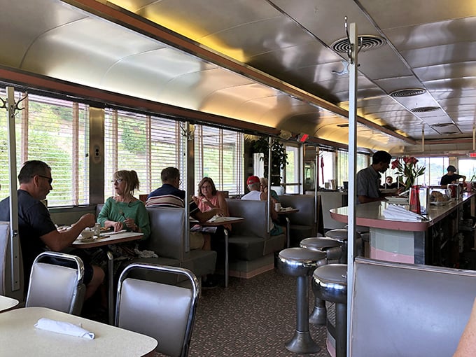 Booths designed for lingering conversations and making memories. The sunlight streaming through those windows has illuminated generations of family meals.
