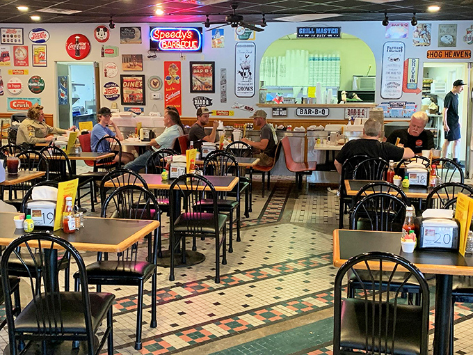 The dining room hums with the sacred ritual of barbecue appreciation, where locals and pilgrims gather to worship at the altar of smoked meat.