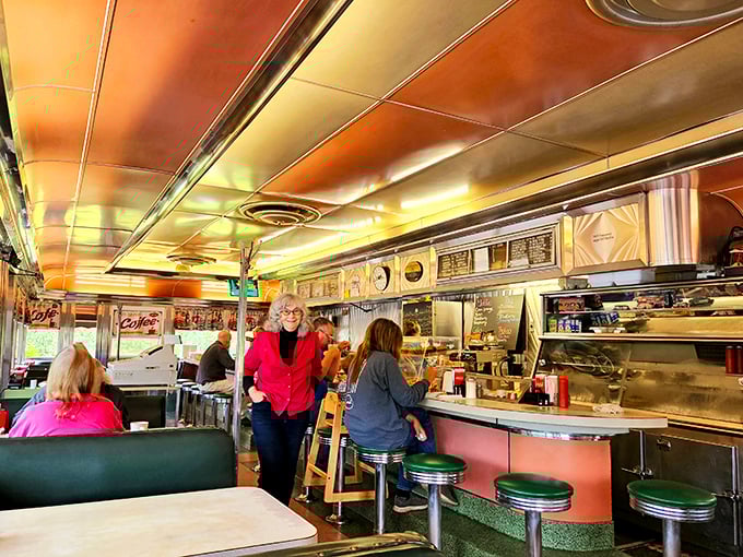 The heartbeat of any great diner is the counter where food magic happens and regulars hold court like breakfast royalty.