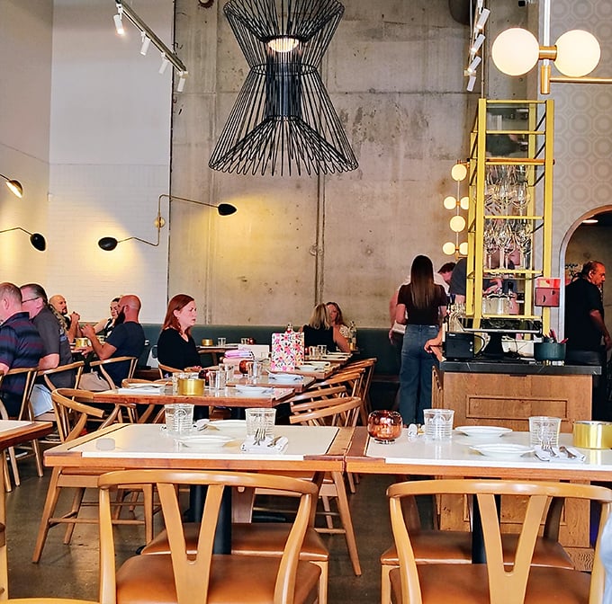 Dinner at Speck isn't just eating—it's a social occasion where conversations flow as smoothly as the wine, under sculptural lighting that flatters everyone.