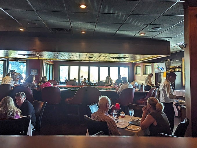 The dining room hums with conversation and clinking glasses &ndash; where business deals and anniversary celebrations happen side by side.