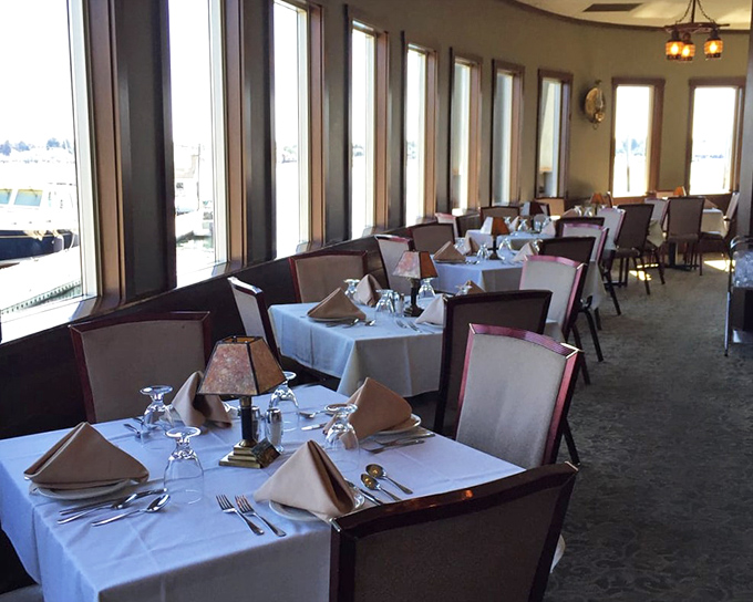White tablecloths and harbor views create the perfect backdrop for seafood romance – just add candlelight.