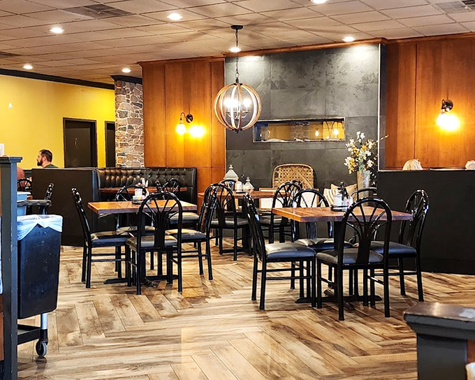 The dining room's warm wood tones and stone accents create that rare atmosphere where both special occasions and Tuesday lunch feel equally at home.