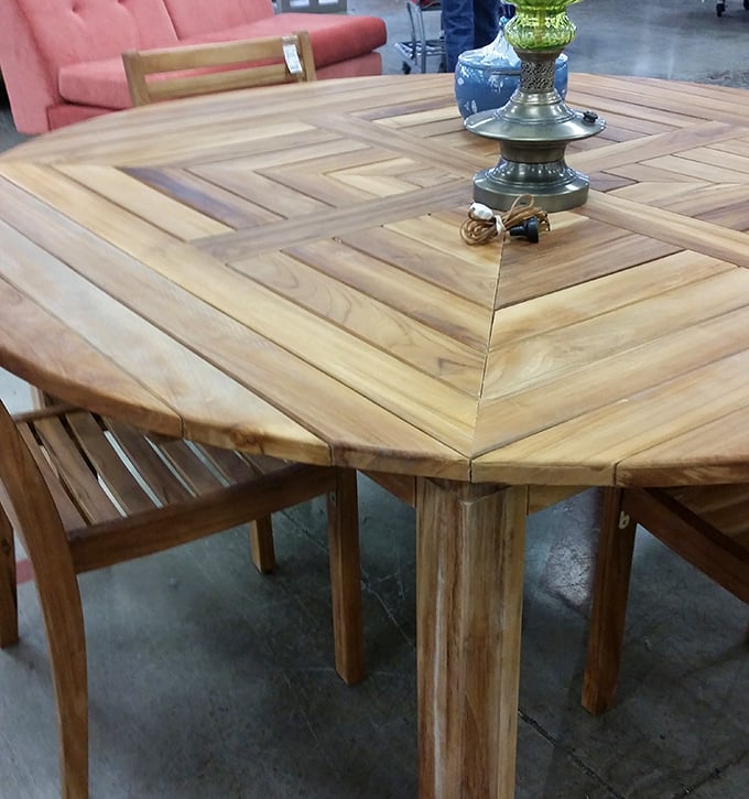 This wooden dining table isn't just furniture; it's a blank canvas for future family gatherings, board game battles, and midnight snacks.
