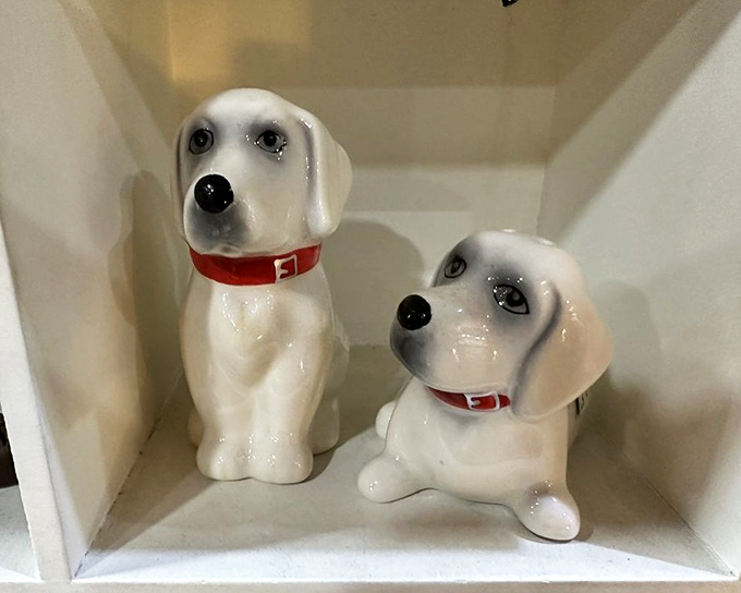 Ceramic pups frozen in eternal cuteness, probably worth more than your actual dog's vet bills.