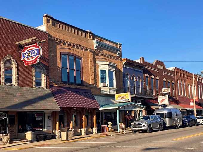 Historic buildings line the street like sentinels of simpler times, when downtowns were destinations and neighbors knew your coffee order.
