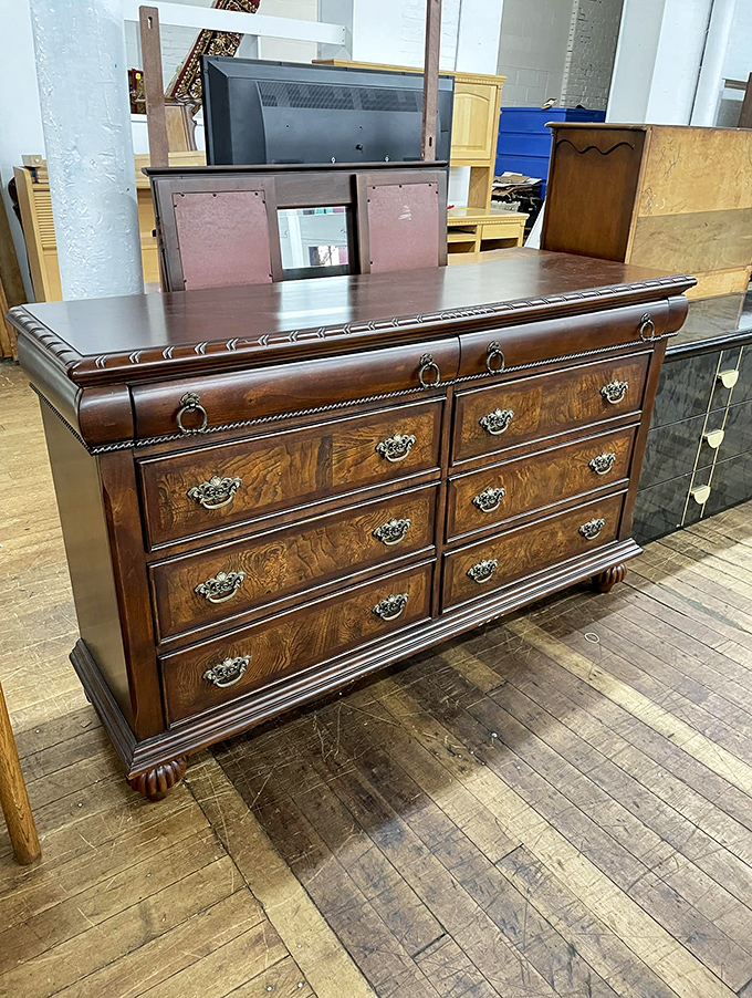 This dresser isn't just furniture&mdash;it's functional art with burled wood panels and brass pulls that would cost a fortune new. Thrift store magic!