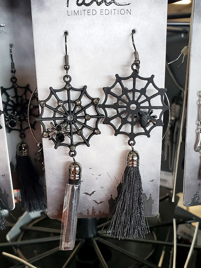 Gothic spider web earrings dangle with dramatic flair—perfect for Halloween enthusiasts or those who embrace spooky style year-round.