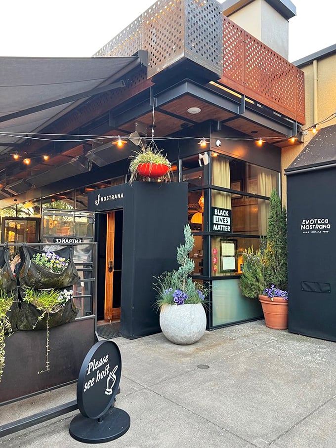 "Please see host" reads the sign, but what it really means is "Your culinary adventure is about to begin."