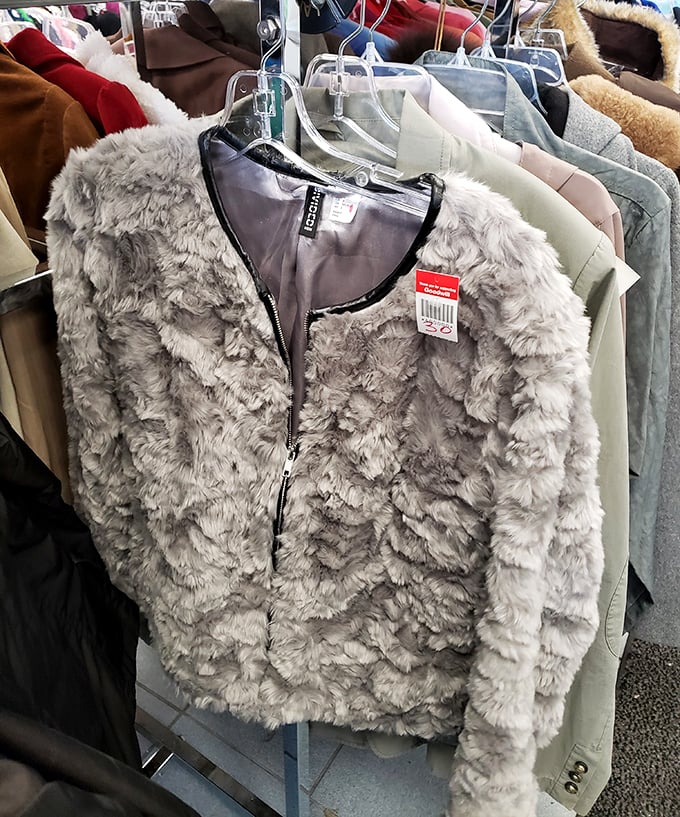 The circle of fashion life: This plush gray jacket waits for its second chance at winter glamour, tags still attached.