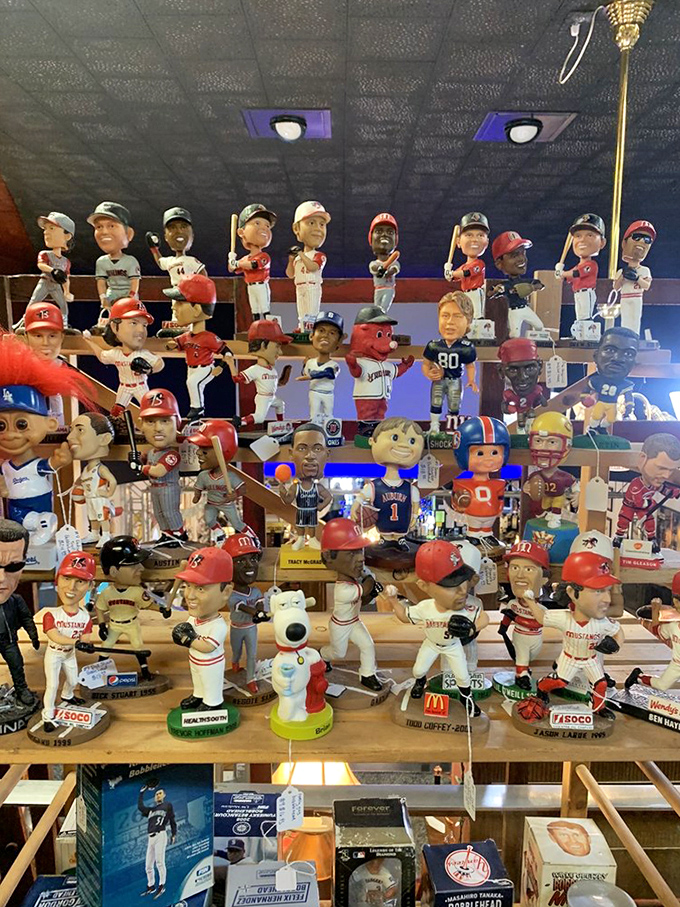 The bobblehead hall of fame! Each nodding figure represents someone's childhood hero, preserved in perpetual agreement with whatever you say.