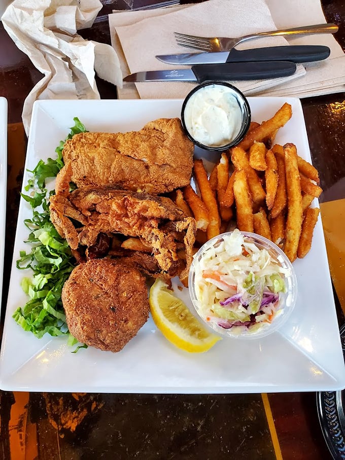 Fried fish that achieves the impossible: staying crispy despite the waterfront humidity and your eager anticipation.