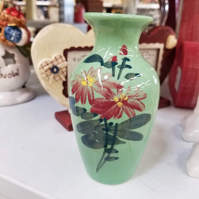 This mint green vase didn't choose the thrift life; the thrift life chose it. Now it's ready for your windowsill.