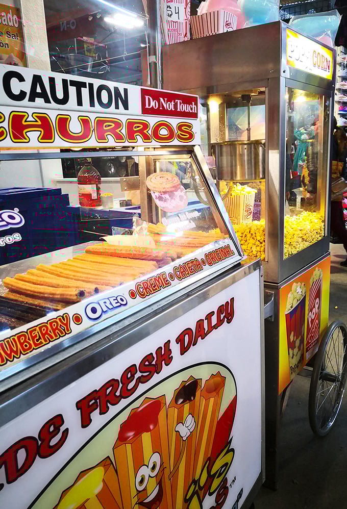 The churro stand&mdash;where cinnamon-sugar dreams come true and diet plans go to die a deliciously crispy death. 