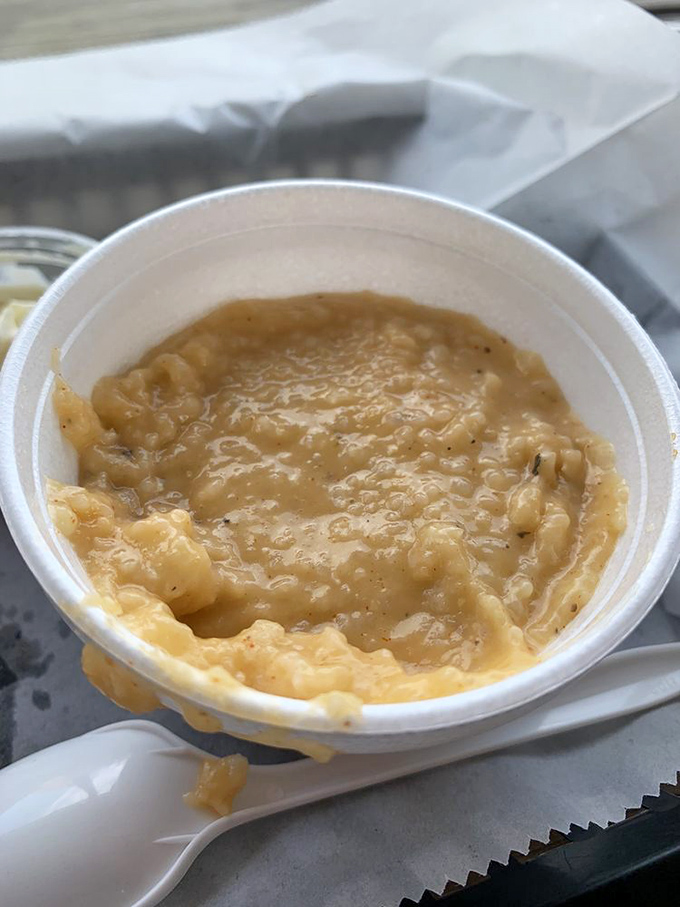 Grits that would make a Southern grandmother nod in approval &ndash; creamy, substantial, and the perfect canvas for smoky barbecue companions.