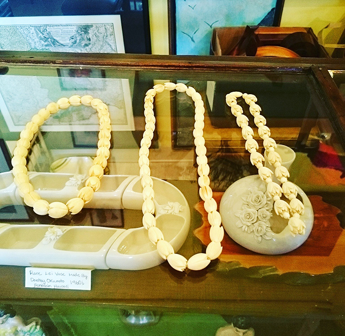 Delicate treasures under glass. These hand-carved ivory pieces represent a traditional Hawaiian art form that's become increasingly rare and valuable.