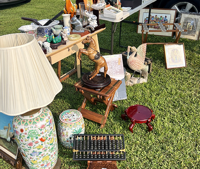 The eclectic decorator's dream table—where Chinese vases meet brass figurines and vintage lamps. Your living room could look this interesting with just one well-spent Sunday.