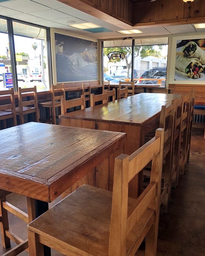 Sunlight streams through windows, illuminating wooden tables that have witnessed countless first bites and "you've got to try this" moments.