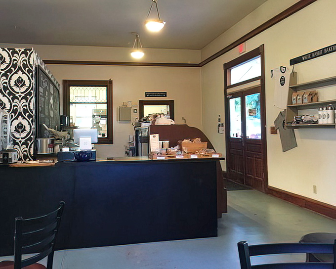 The counter where magic happens daily. Black and white damask pattern above adds a touch of elegance to this temple of flour and sugar.
