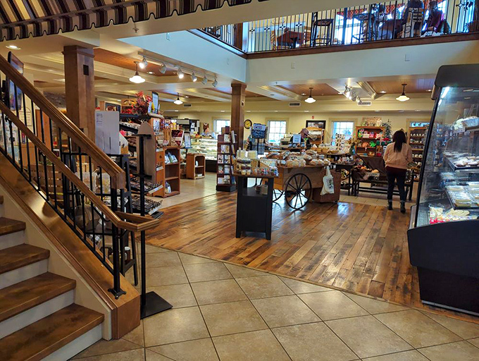 Two floors of temptation where resistance is futile. The wooden beams and warm lighting create the perfect backdrop for serious food decisions.