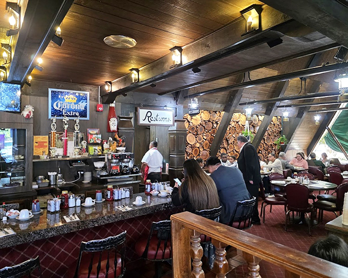 Where breakfast dreams come true &ndash; the bustling interior reveals the morning ritual of coffee pouring, orders flying, and hungry patrons anticipating their feast.