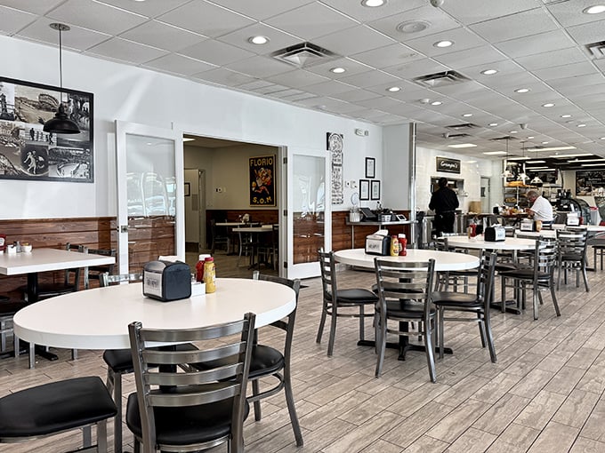 Another angle revealing wood accents and vintage photos on the walls &ndash; comfort without trying too hard to be trendy.