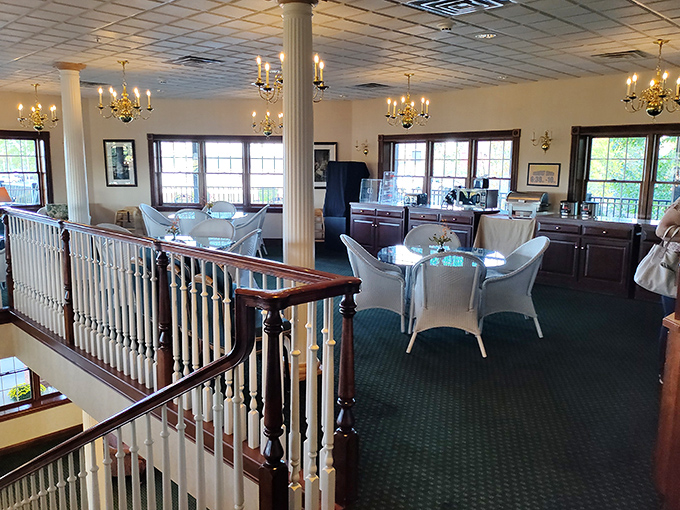 The upper dining area features elegant chandeliers and plenty of seating for families who traveled hours for legendary comfort food.