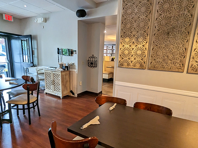 Decorative wall panels and thoughtful touches show someone cares about the space as much as the food coming out.