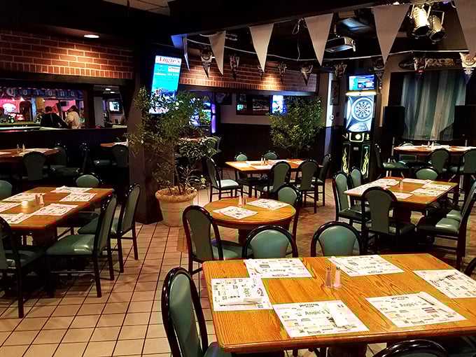 The lounge area offers a different vibe &ndash; wooden tables, mint green chairs, and just enough space to recover from your food coma.