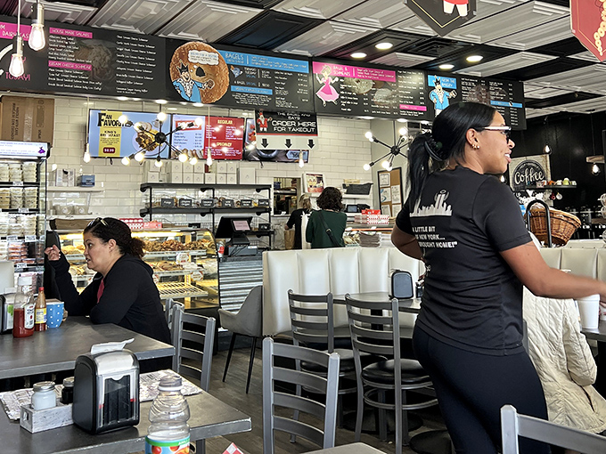 Modern touches blend with deli traditions in a space where conversations flow as freely as the coffee refills.