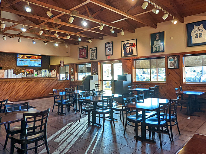 Another angle reveals more sports jerseys and wooden accents &ndash; the classic barbecue joint aesthetic that never goes out of style.