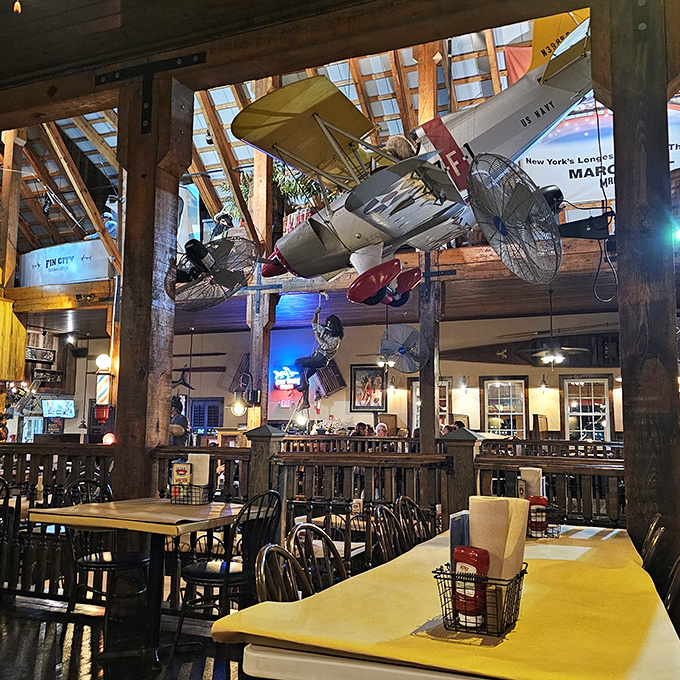 Vintage airplanes suspended from the ceiling &ndash; because when you're this good at seafood, gravity's rules no longer apply.