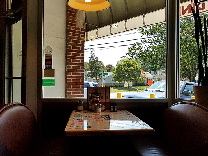 That window seat offers a front-row view to the neighborhood while you contemplate ordering seconds—or thirds.
