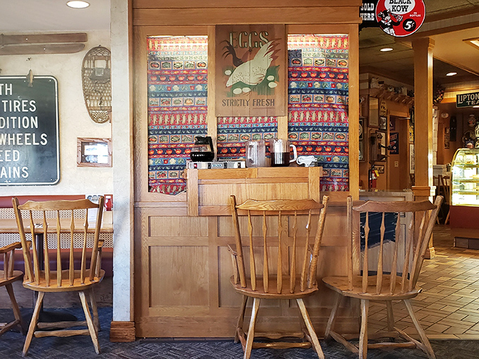 Wooden spindle chairs and nostalgic decor create that perfect small-town diner atmosphere where conversations flow as freely as the coffee refills.