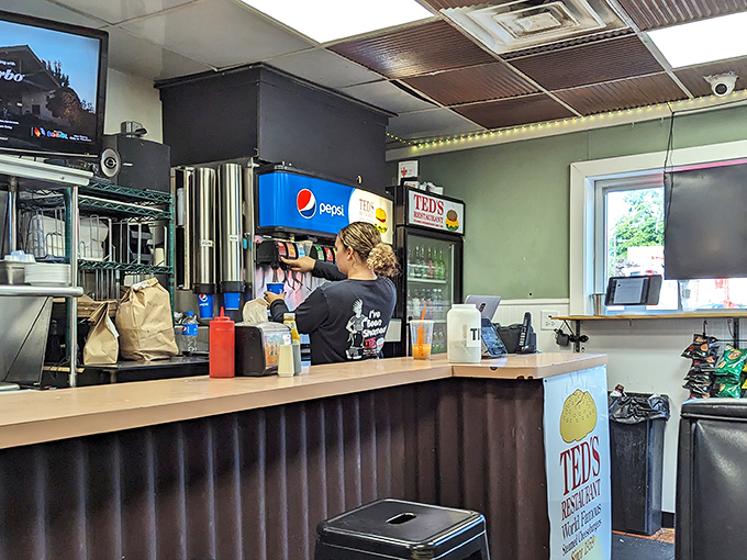 The open kitchen design means transparency isn't just a buzzword&mdash;it's dinner theater where burgers are the stars of the show.