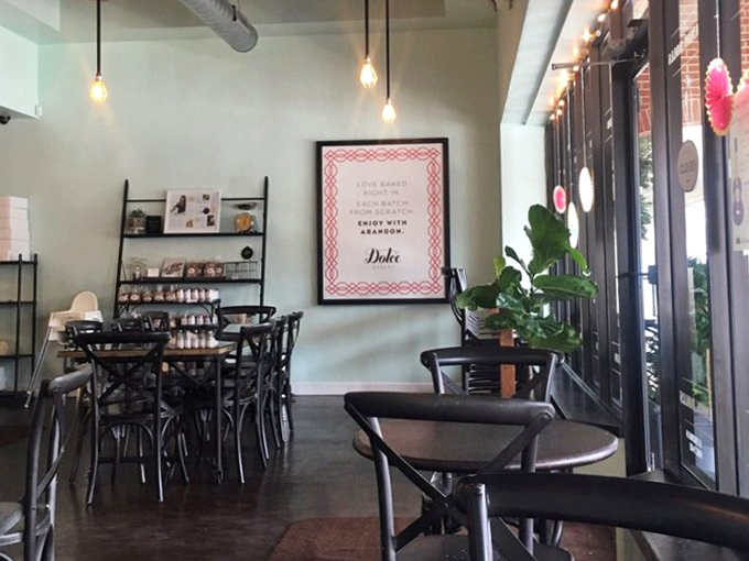 The interior speaks the universal language of "stay awhile"—where conversations flow as smoothly as their coffee.