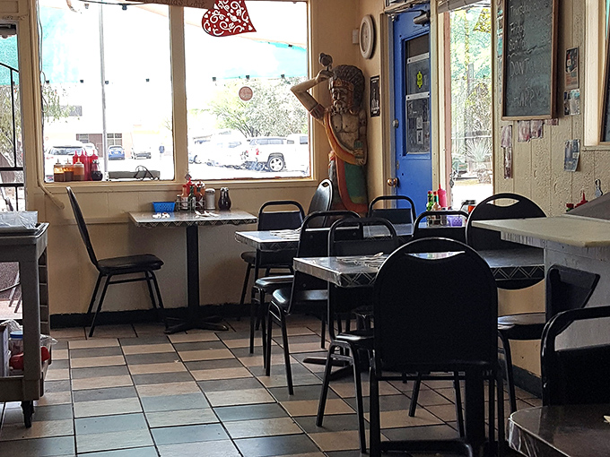 Simple tables, blue trim, and enough character to fill a novel. Frank's interior doesn't need designer touches when it's already dressed in authenticity.