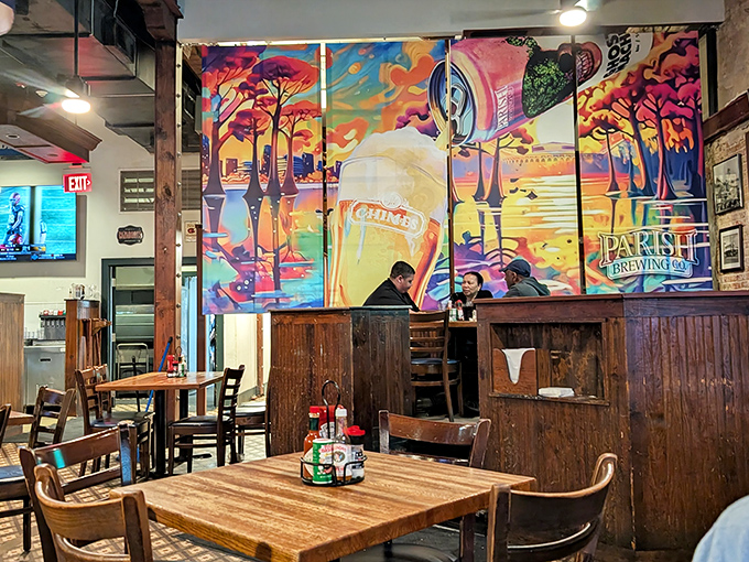 The warm wooden interior creates the perfect backdrop for conversations that flow as freely as the local brews on tap.