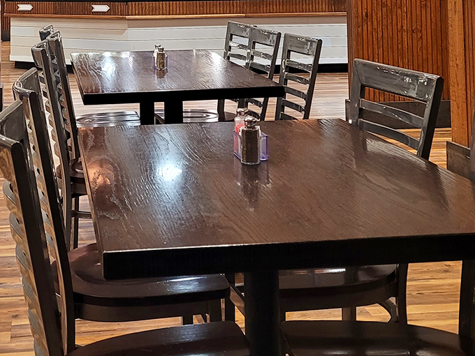 Dark wood tables await hungry patrons&mdash;simple, sturdy Midwestern furniture that says "we focus on the food, not the frills."