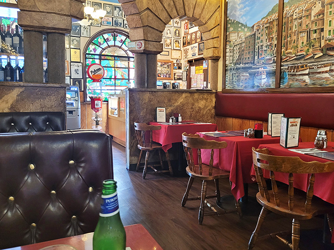 Red tablecloths, wooden chairs, and Italian landscapes – the classic Italian restaurant décor that feels like a warm embrace.