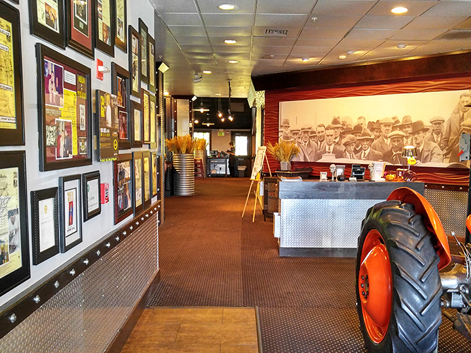 The walls tell stories of farm heritage while diners create new memories. Notice the tractor wheel—a subtle reminder of where these massive portions originated.