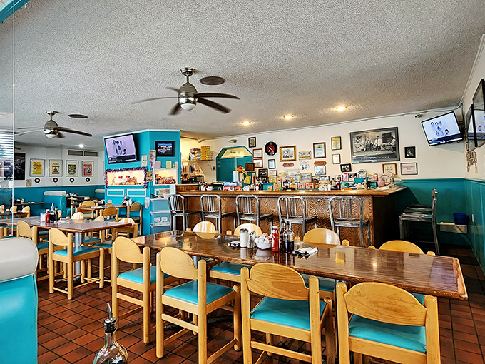 The dining room's cheerful turquoise booths and vintage touches make every meal feel like a special occasion.