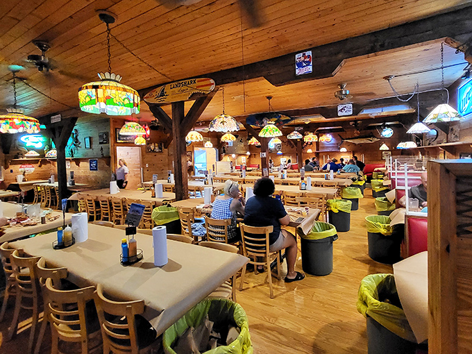 The dining room buzzes with the symphony of crab mallets and satisfied conversation. Those yellow buckets aren't for sand castles&mdash;they're for shells!
