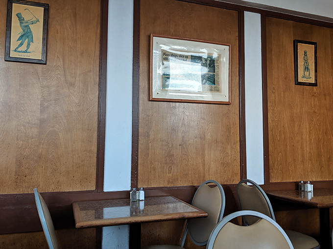 Simple wooden paneling and booth seating create the perfect backdrop for the real star of the show&mdash;whatever's on your plate.