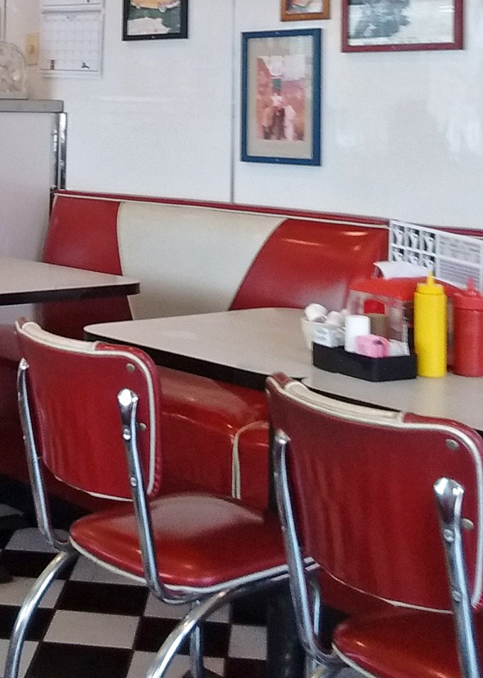 Every inch of wall space tells a story, from Route 66 to "Kiss My Grits." This isn't just eating&mdash;it's dining inside a scrapbook of American road culture.